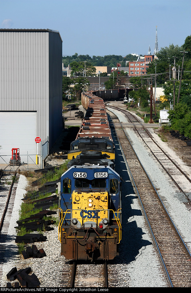 CSX 8156 leads Herzog ballast train Y171 across Godfrey Ave.